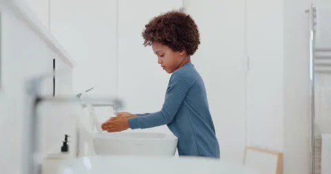 Child, washing hands and water with soap... | Stock Video | Pond5