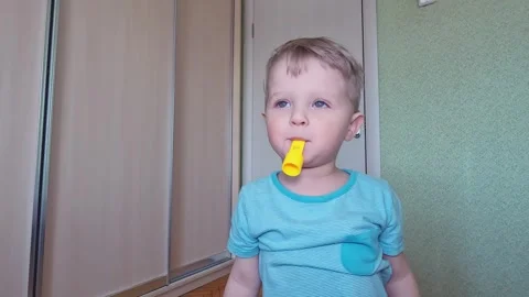 The child whistles. The concept of breat... | Stock Video | Pond5