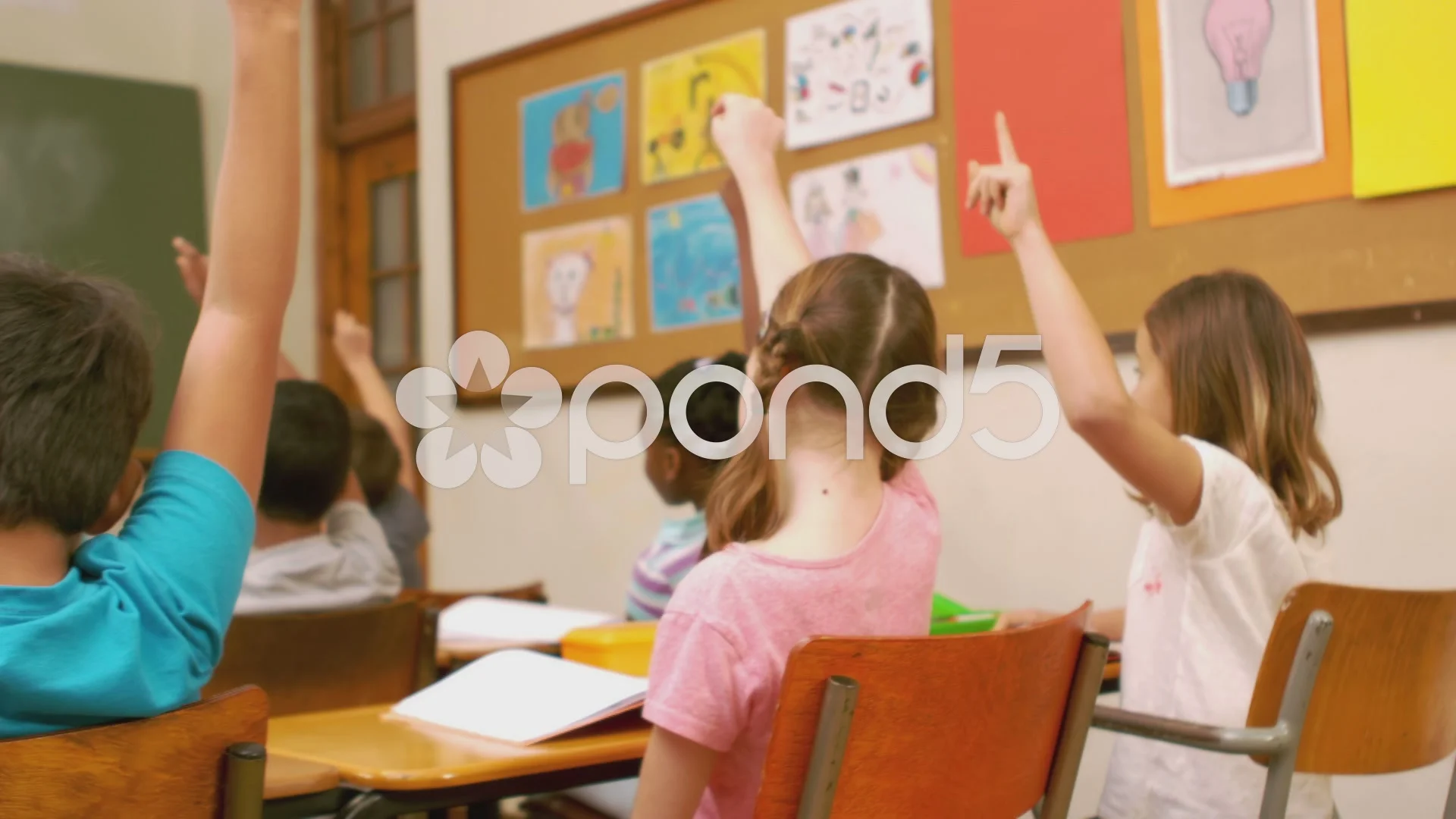 Kindergarten Class Raising Hands