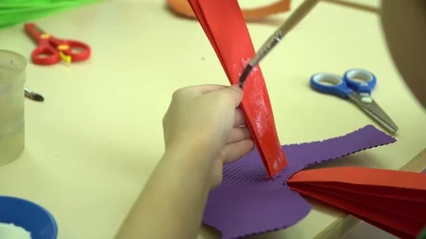 children draw and cut out of paper | Stock Video | Pond5