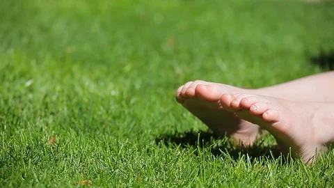 children girl foot grass background hd f... | Stock Video | Pond5