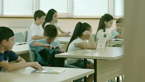 Children go out from classroom to the sc... | Stock Video | Pond5