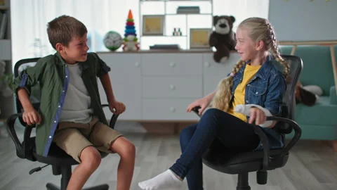 children have fun ride on chairs, active... | Stock Video | Pond5