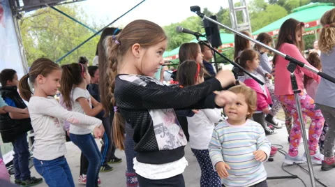 Children kids dancing on a park stage en... | Stock Video | Pond5