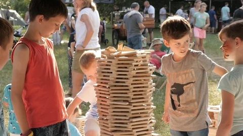 Children Kids play build a Tower with wo... | Stock Video | Pond5