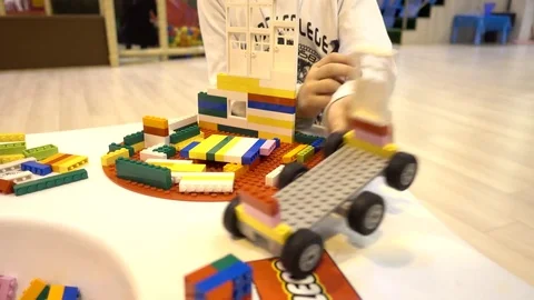 Children kids playing with Lego construc... | Stock Video | Pond5