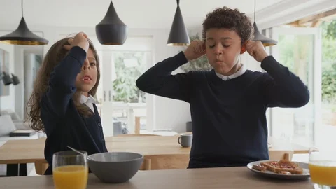Children At Kitchen Counter Eating Break... | Stock Video | Pond5