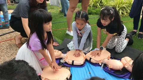 Cpr Girl Stock Video Footage | Royalty Free Cpr Girl Videos | Pond5