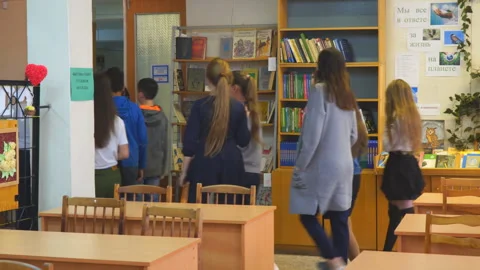 Children leave the classroom after class | Stock Video | Pond5