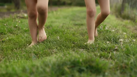 Children legs walking together barefoot ... | Stock Video | Pond5