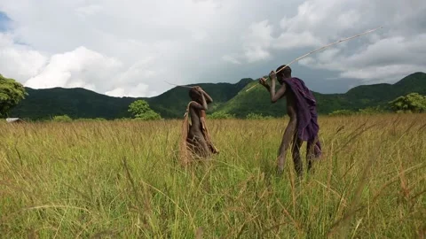 Children making a donga stick fighting i... | Stock Video | Pond5