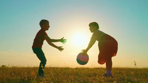 Children play with big ball in park agai... | Stock Video | Pond5