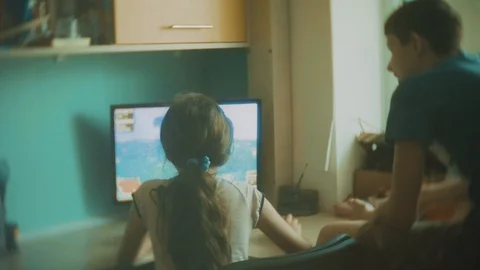 children play computer in video games. b... | Stock Video | Pond5