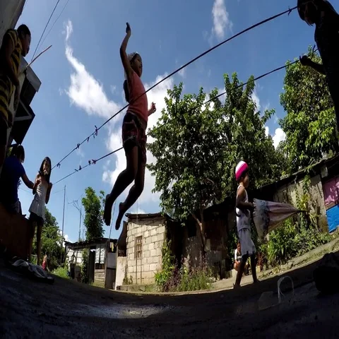 Children playing Chinese garter jump rop... | Stock Video | Pond5