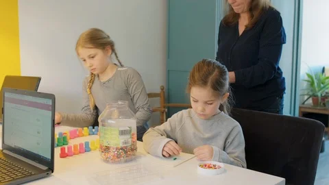 Children playing at desk | Stock Video | Pond5