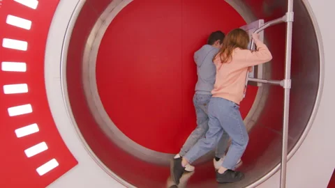 Children playing heart-rating simulator ... | Stock Video | Pond5