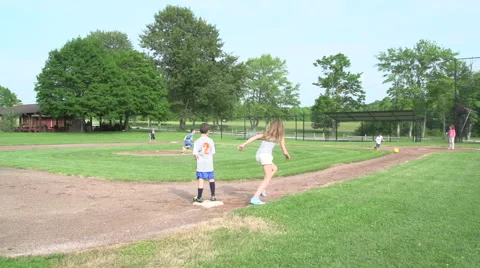 Playing Kickball Stock Footage ~ Royalty Free Stock Videos | Pond5