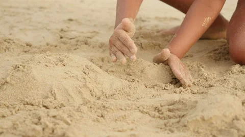 Patting Sand Stock Video Footage | Royalty Free Patting Sand Videos | Pond5