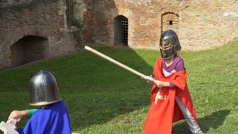 Children Playing Swords Fighting Duel Gl... | Stock Video | Pond5