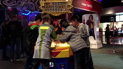 Children playing wheel of fortune game a... | Stock Video | Pond5