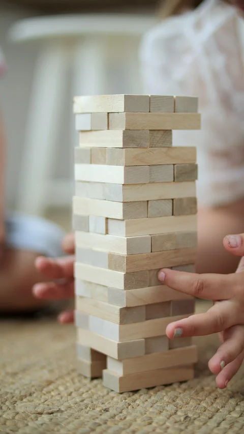 children playing wooden brick tower jeng... | Stock Video | Pond5
