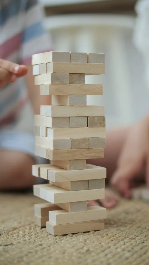 children playing wooden brick tower jeng... | Stock Video | Pond5