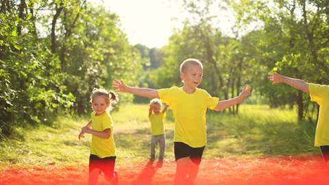 children running in the park relay race.... | Stock Video | Pond5