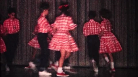 children square dance on stage for famil... | Stock Video | Pond5