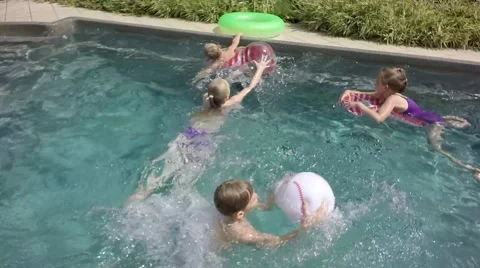 Children throw Beach Ball. Slow motion | Stock Video | Pond5