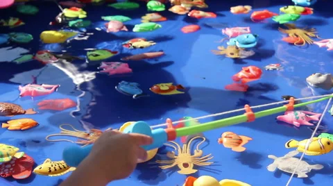 children toys are caught using fishing r... | Stock Video | Pond5