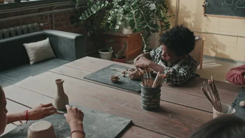 Children Using Tools on Pottery Lesson | Stock Video | Pond5