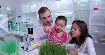 Children Visit Biologist Man Laboratory ... | Stock Video | Pond5
