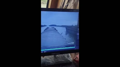 China: Brave captain dives into canal to... | Stock Video | Pond5