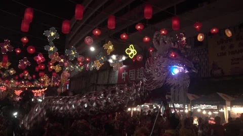 Chinese dragon performing in Chinatown a... | Stock Video | Pond5