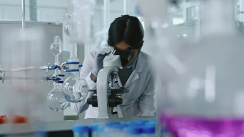 Chinese Female Scientist Studying Sample... | Stock Video | Pond5