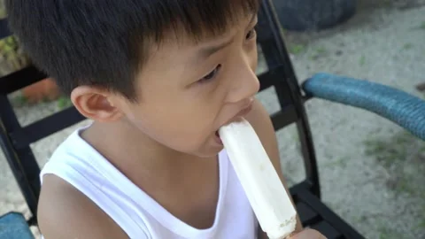 Kid Licking Ice Cream Stock Video Footage | Royalty Free Kid Licking ...