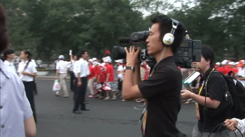 Chinese news crew filming, Beijing Olymp... | Stock Video | Pond5