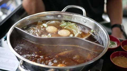 Chinese spicy hot pot cuisine while cook... | Stock Video | Pond5