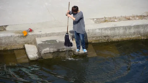 Woman Wash In River Stock Videos – Royalty-Free HD & 4K Videos | Pond5