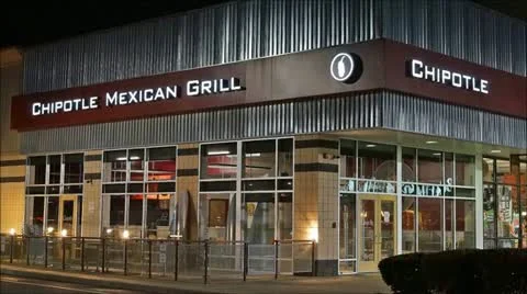 Chipotle restaurant - night time loop | Stock Video | Pond5