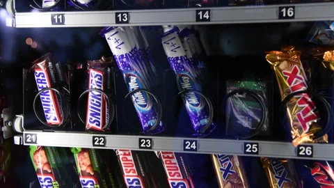 chocolate bars in snack vending machine | Stock Video | Pond5