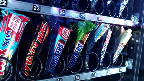 chocolate bars in snack vending machine | Stock Video | Pond5