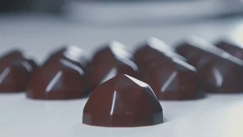 Chocolate candy in the cut. Cut candy. F... | Stock Video | Pond5