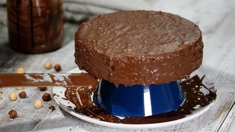 The chocolate icing on the froasted cake... | Stock Video | Pond5