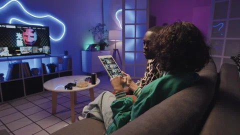 Choosing Movie in Streaming Service on T... | Stock Video | Pond5