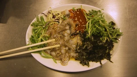 Chopped Live Squid Dish Moving at Gwangj... | Stock Video | Pond5