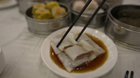 chopsticks grab beef rice noodle dim sum | Stock Video | Pond5