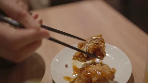 chopsticks grab karaage fried chicken | Stock Video | Pond5