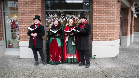 Christmas Caroling quartet in Victorian ... | Stock Video | Pond5