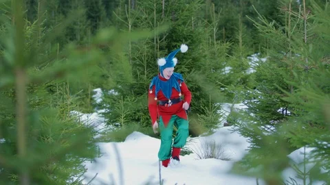 Christmas elf jumping | Stock Video | Pond5